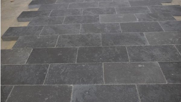 Flamed rectangle black limestone tiles – Chateau limestone Supplier